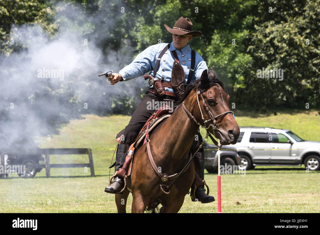 Cowboy Riding Horse Gun High Resolution Stock Photography and Images ...