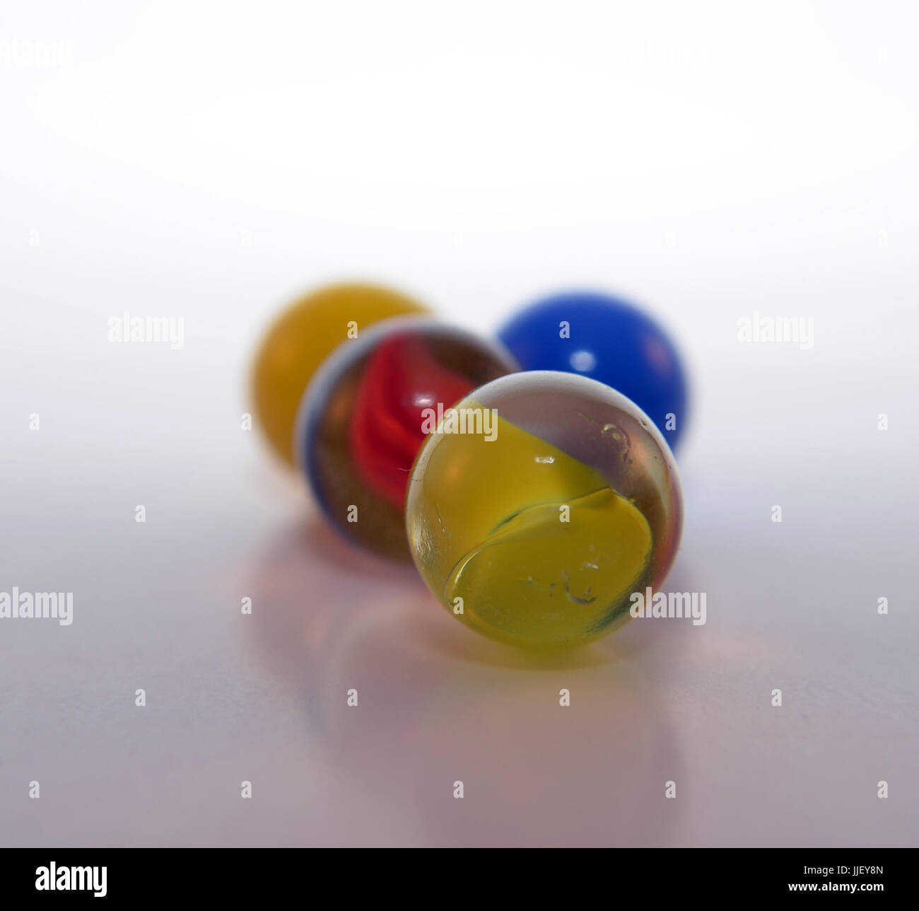 Four marbles hi-res stock photography and images - Alamy