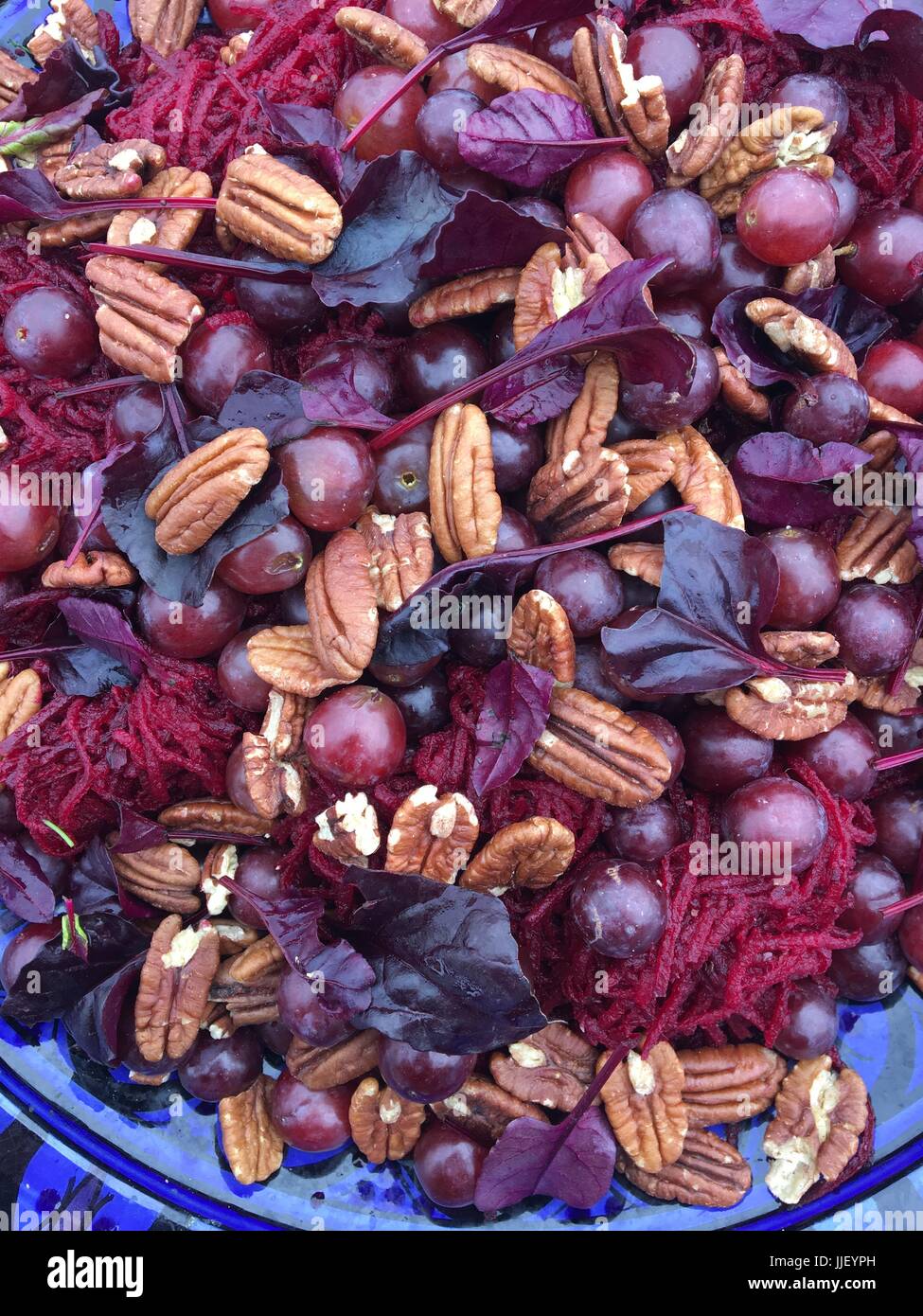 Raw salad with beetroot and grapes Stock Photo - Alamy