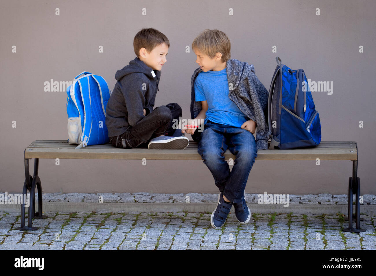 Two Boys Talking At School
