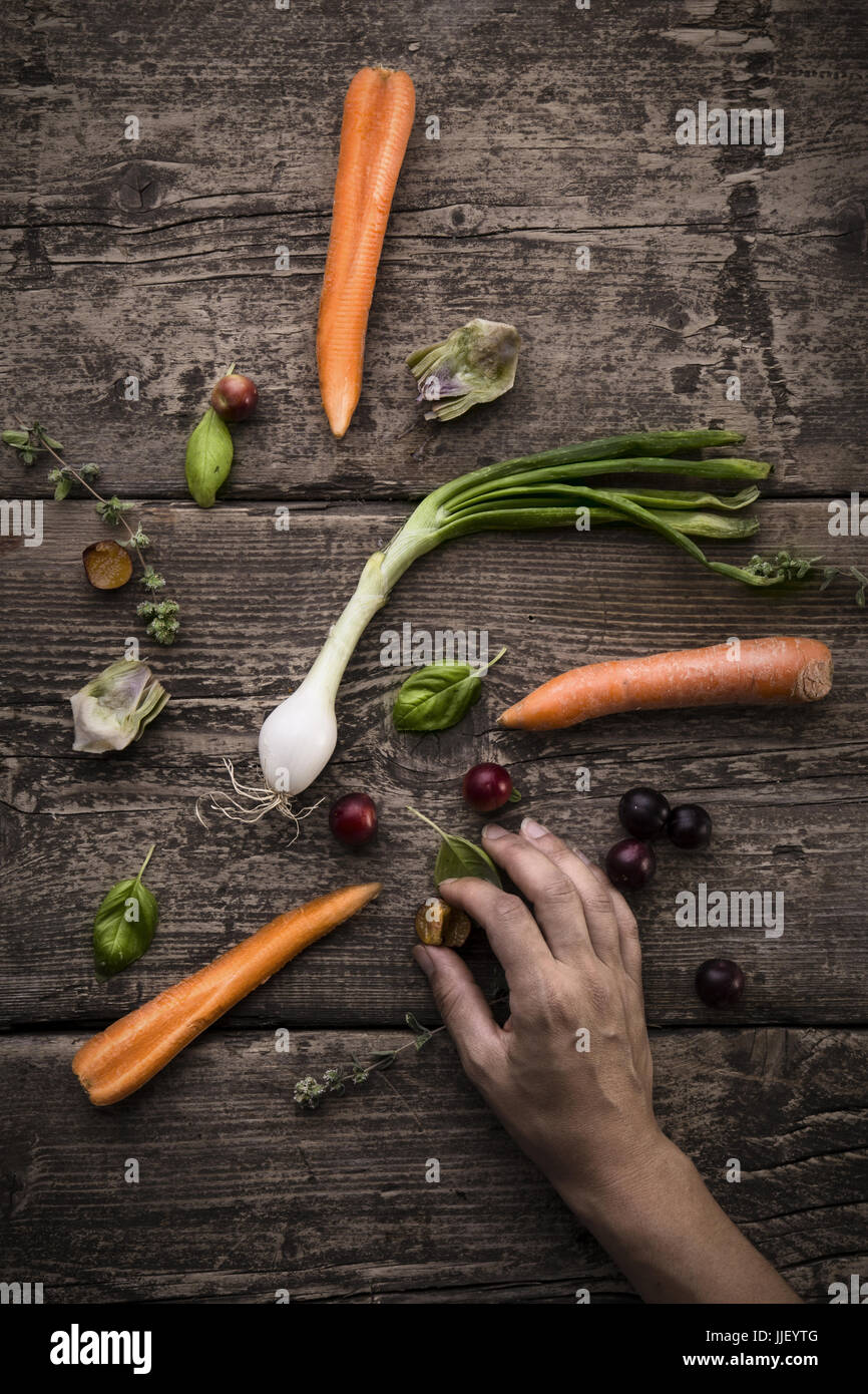 Hand touching fruit hi-res stock photography and images - Alamy