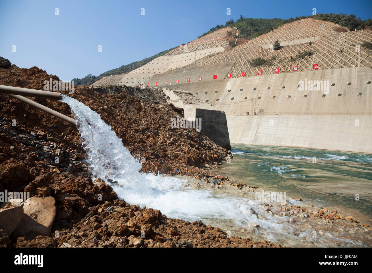 Water is pumped from the original river channel - now a construction ...