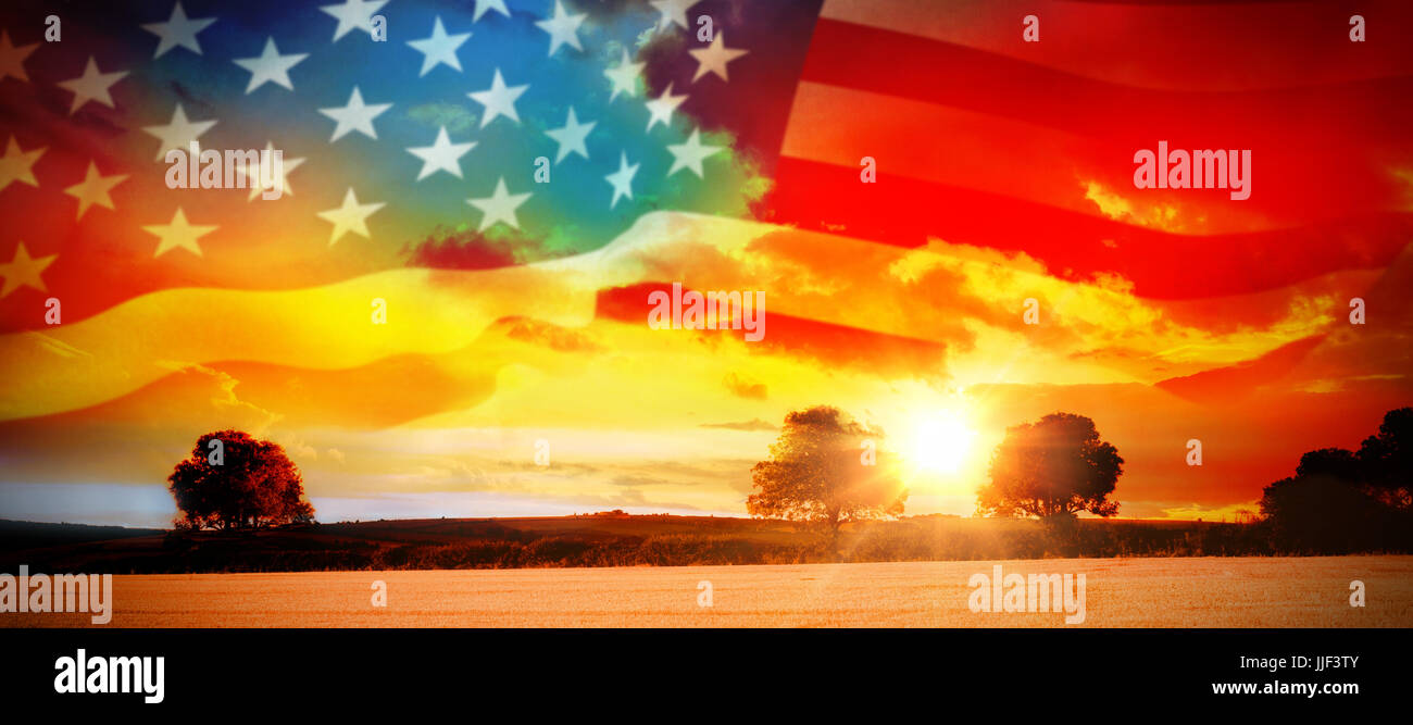 US flag against countryside scene Stock Photo - Alamy