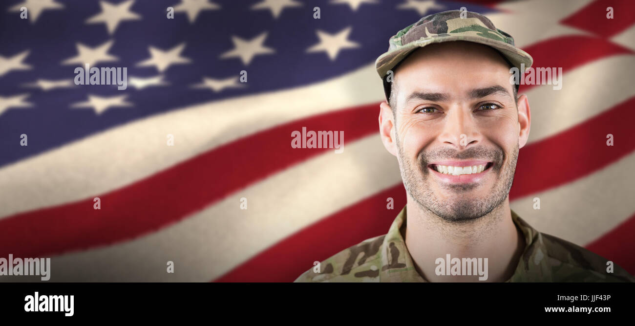 Close up of smiling soldier against waving flag of america Stock Photo ...
