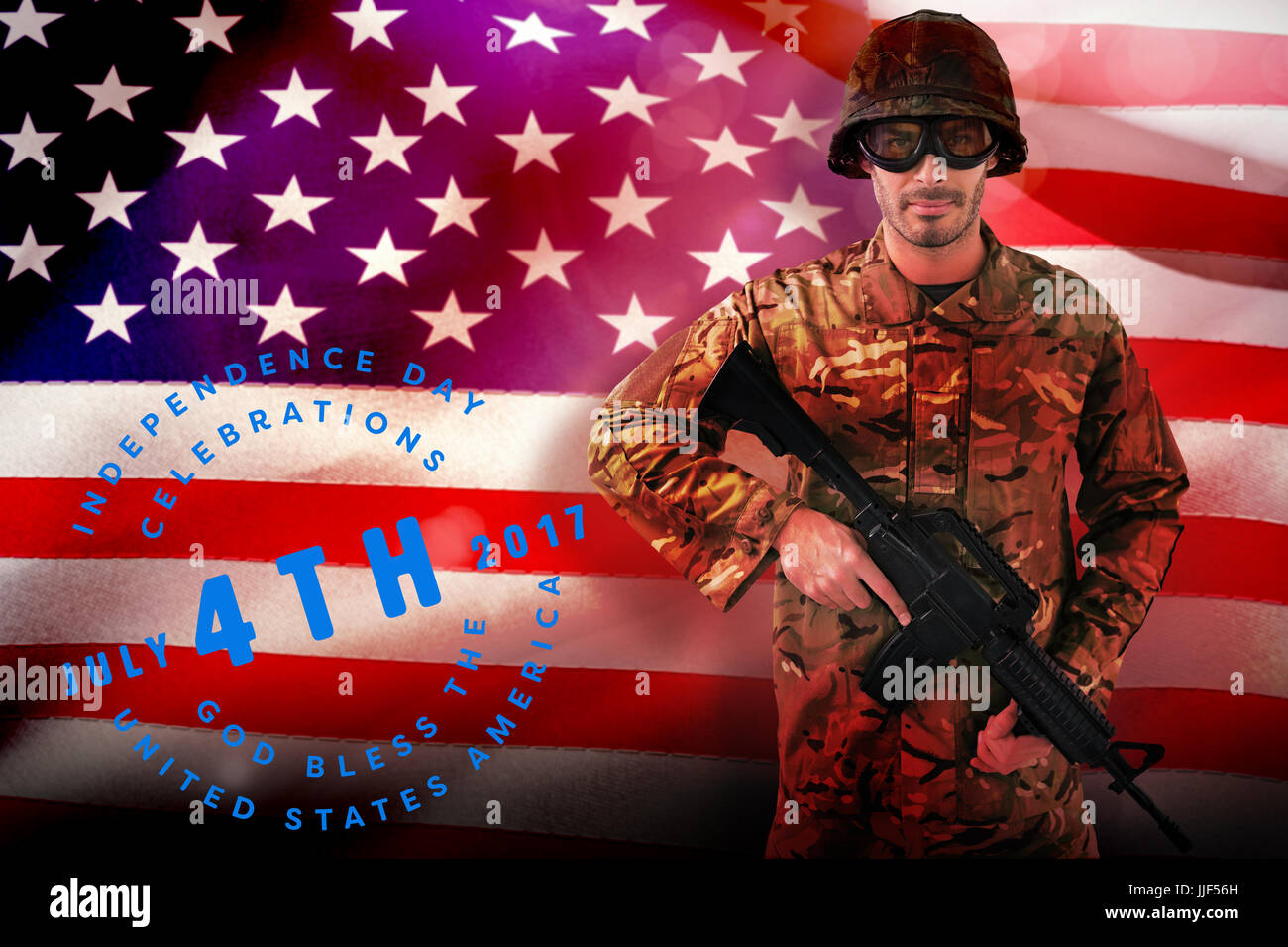 Portrait of soldier holding rifle against close-up of american flag ...