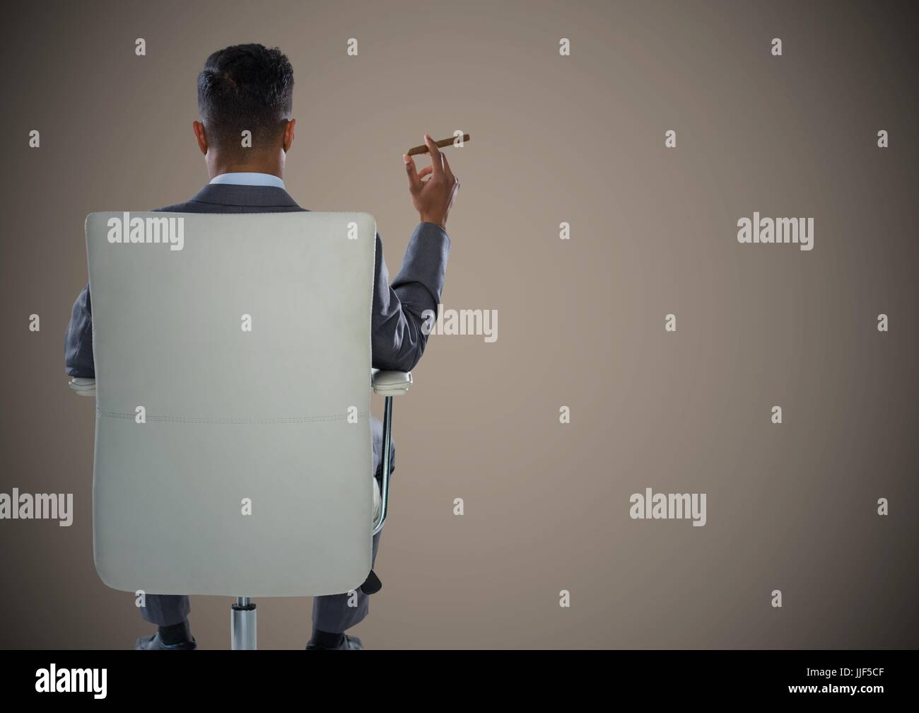 Digital composite of Back of seated business man smoking cigar against ...