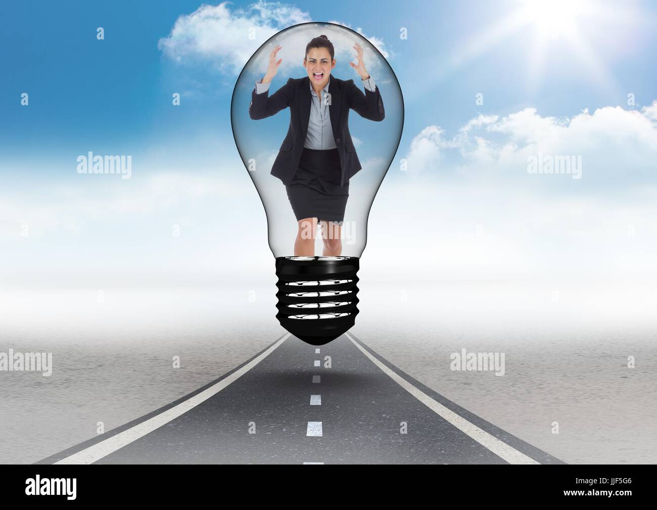 Angry woman in light bulb against cityscape in distance in bright ...