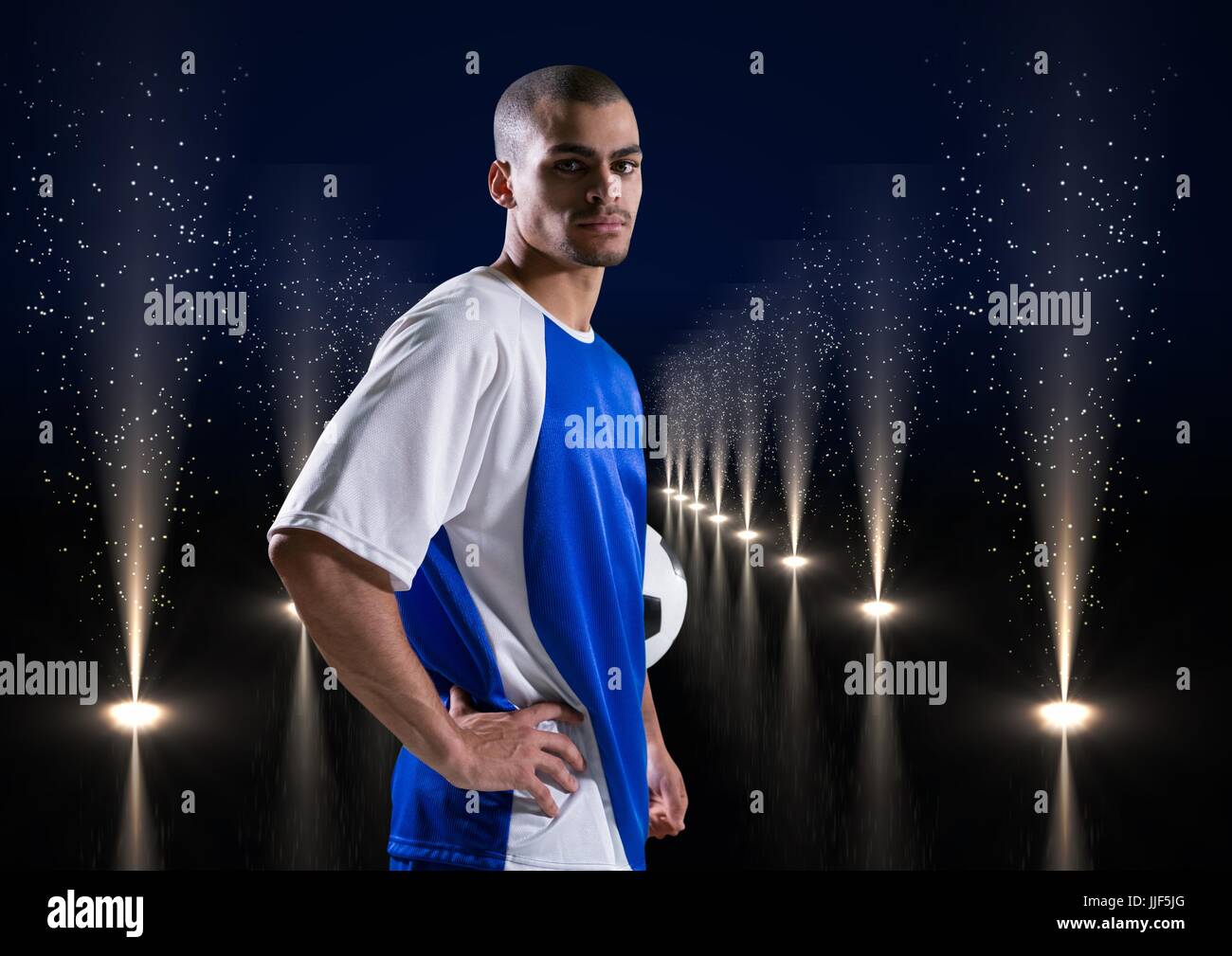Digital composite of blue soccer player in a lights corridor, he is ...