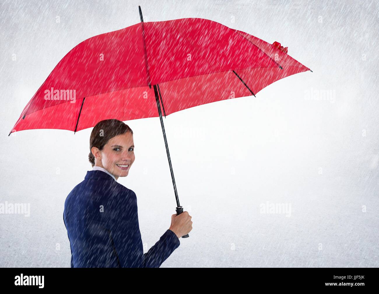 Digital composite of Business woman looking over shoulder with umbrella ...