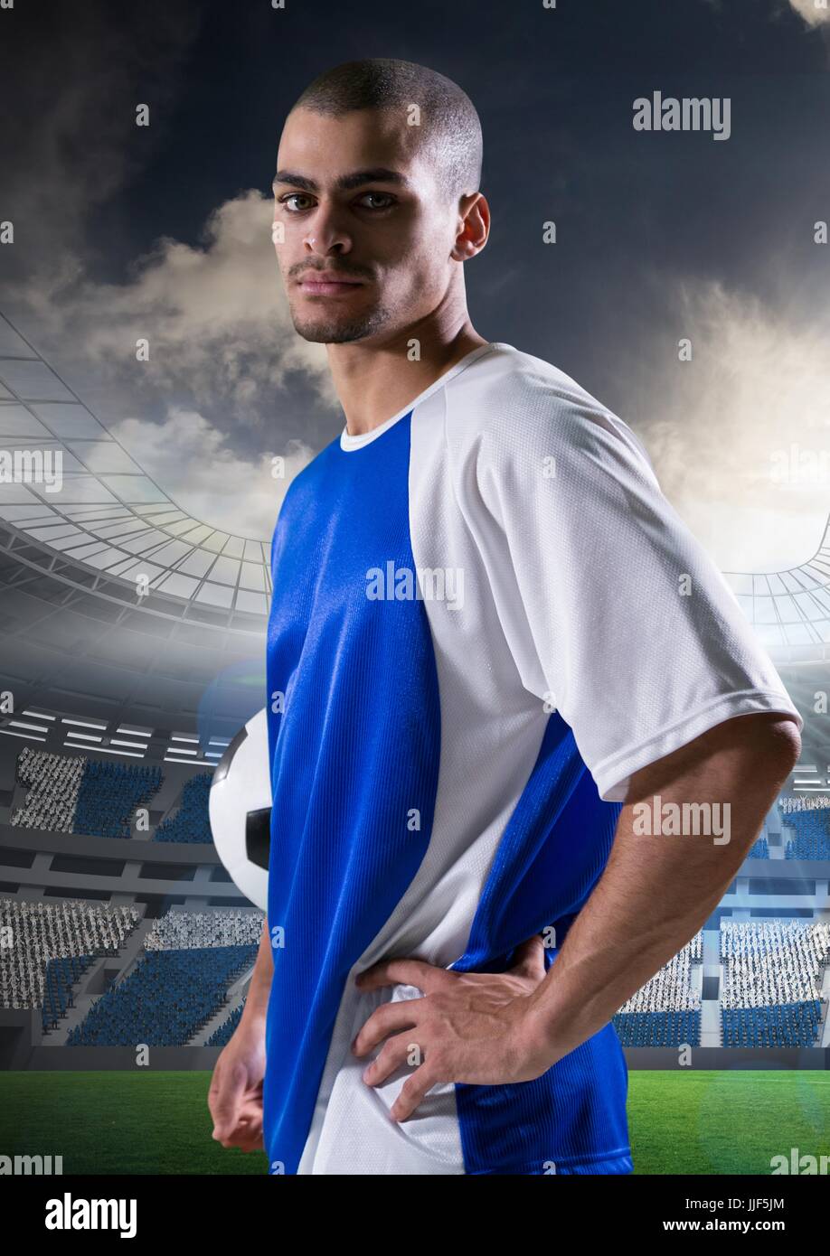Digital composite of soccer player with his hands on the waist and with ...
