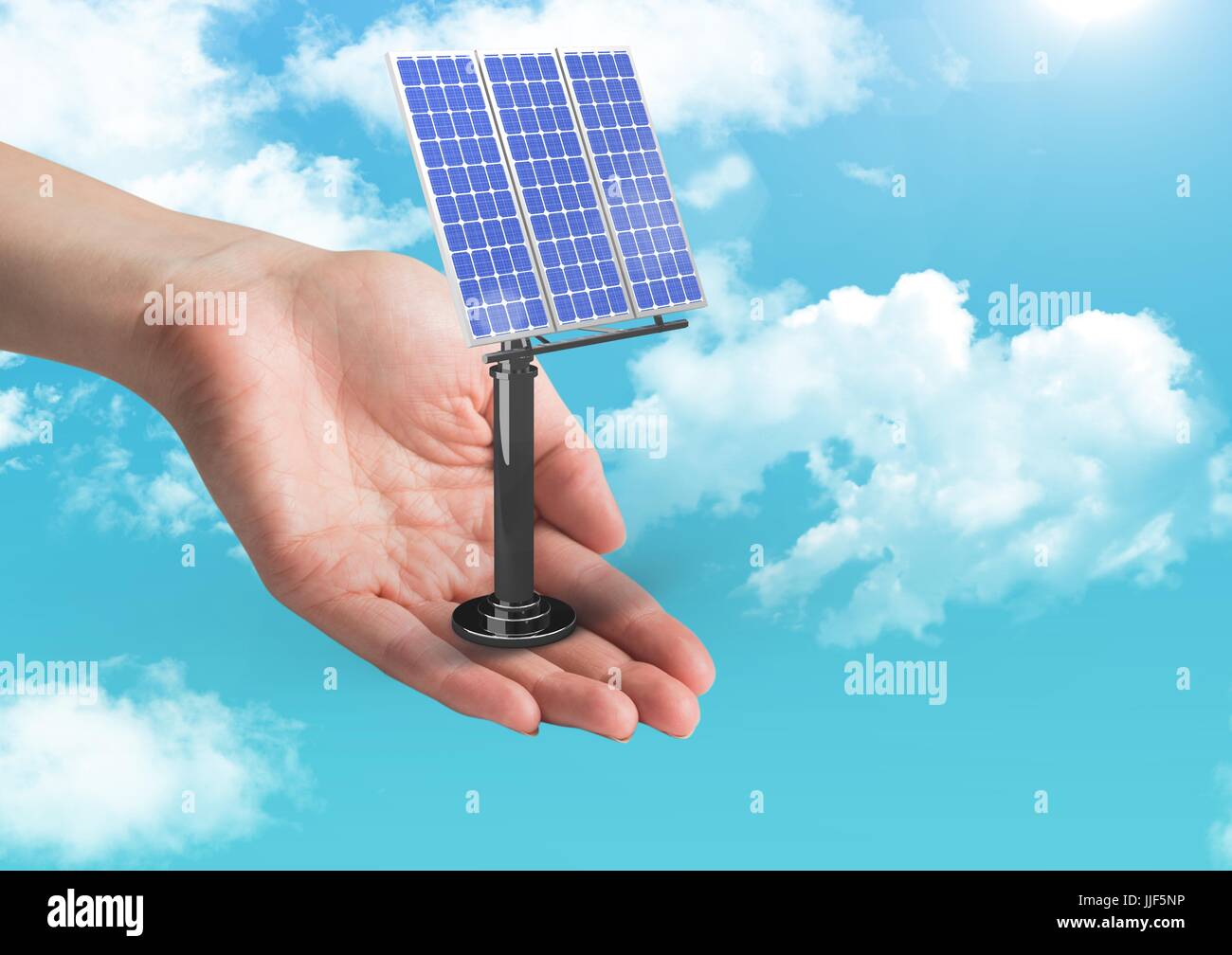 Digital composite of solar panel on hand in the sky Stock Photo - Alamy