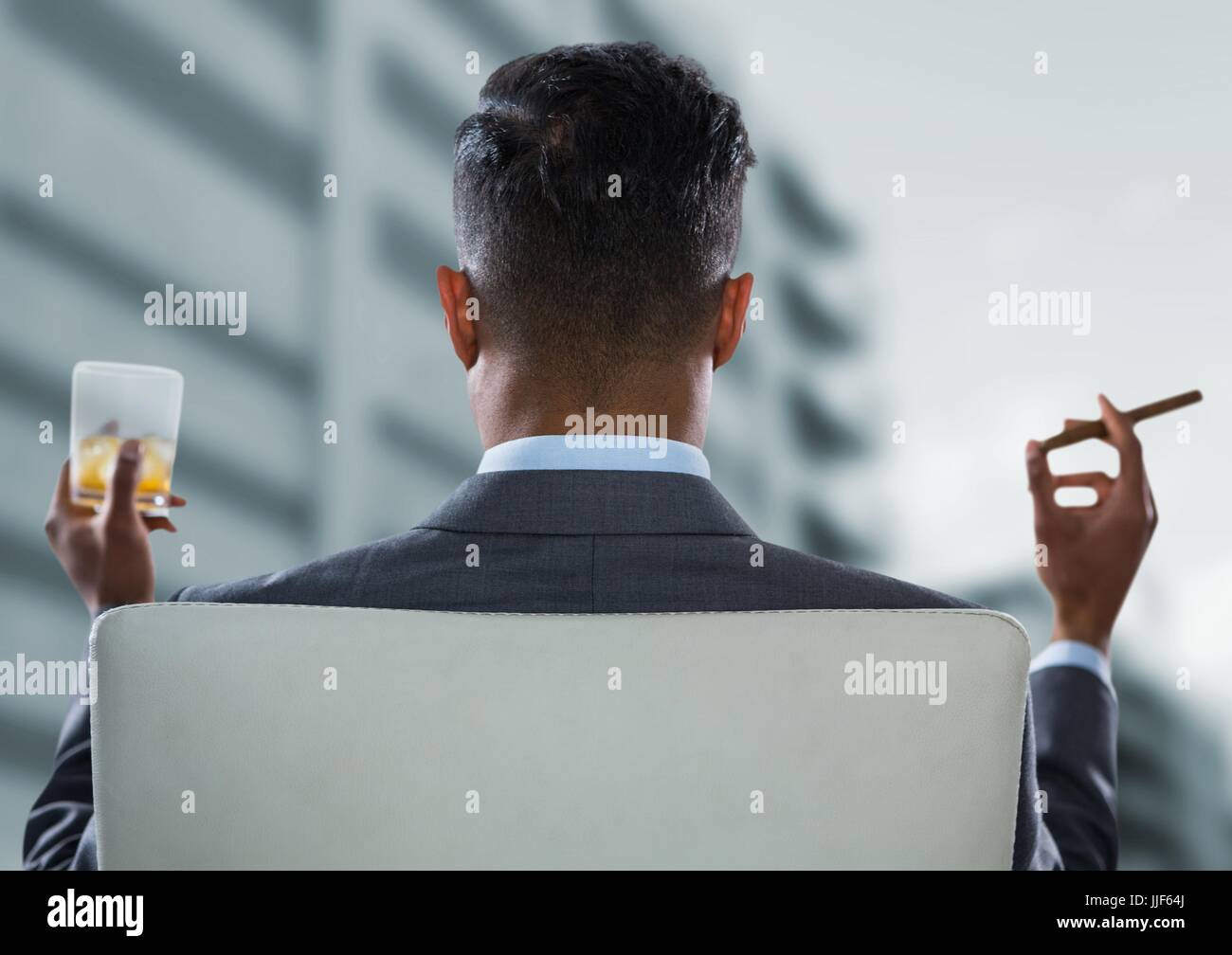 Young man seated low chair hi-res stock photography and images - Alamy