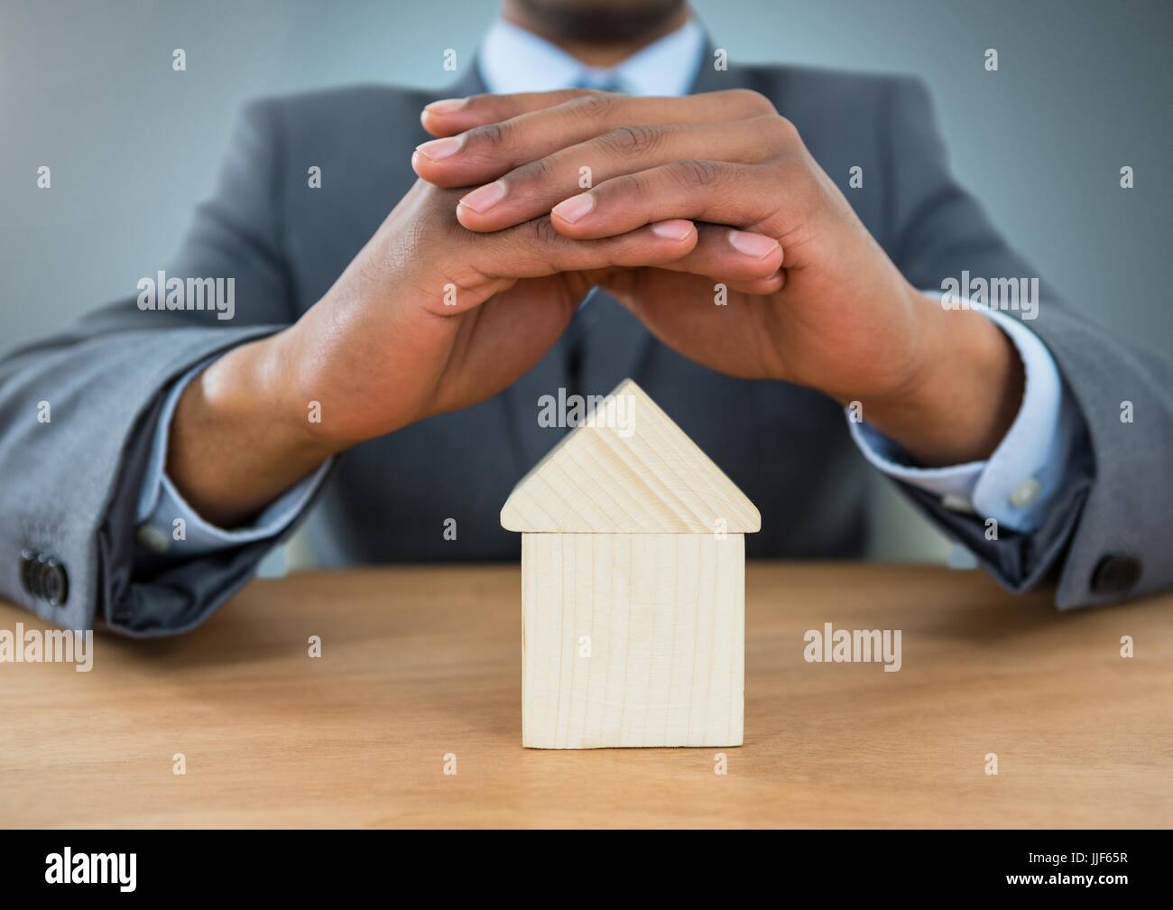 Two hands protecting family hi-res stock photography and images - Alamy