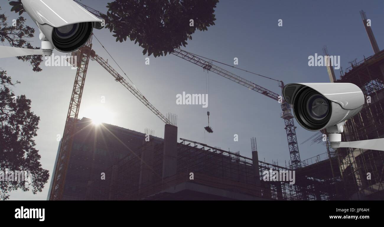 Digital composite of 2 CCTV and a construction in front of a sunset ...