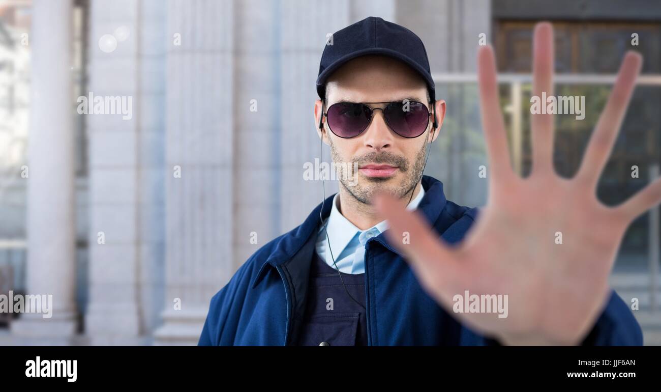 Digital composite of Security man outside building Stock Photo - Alamy
