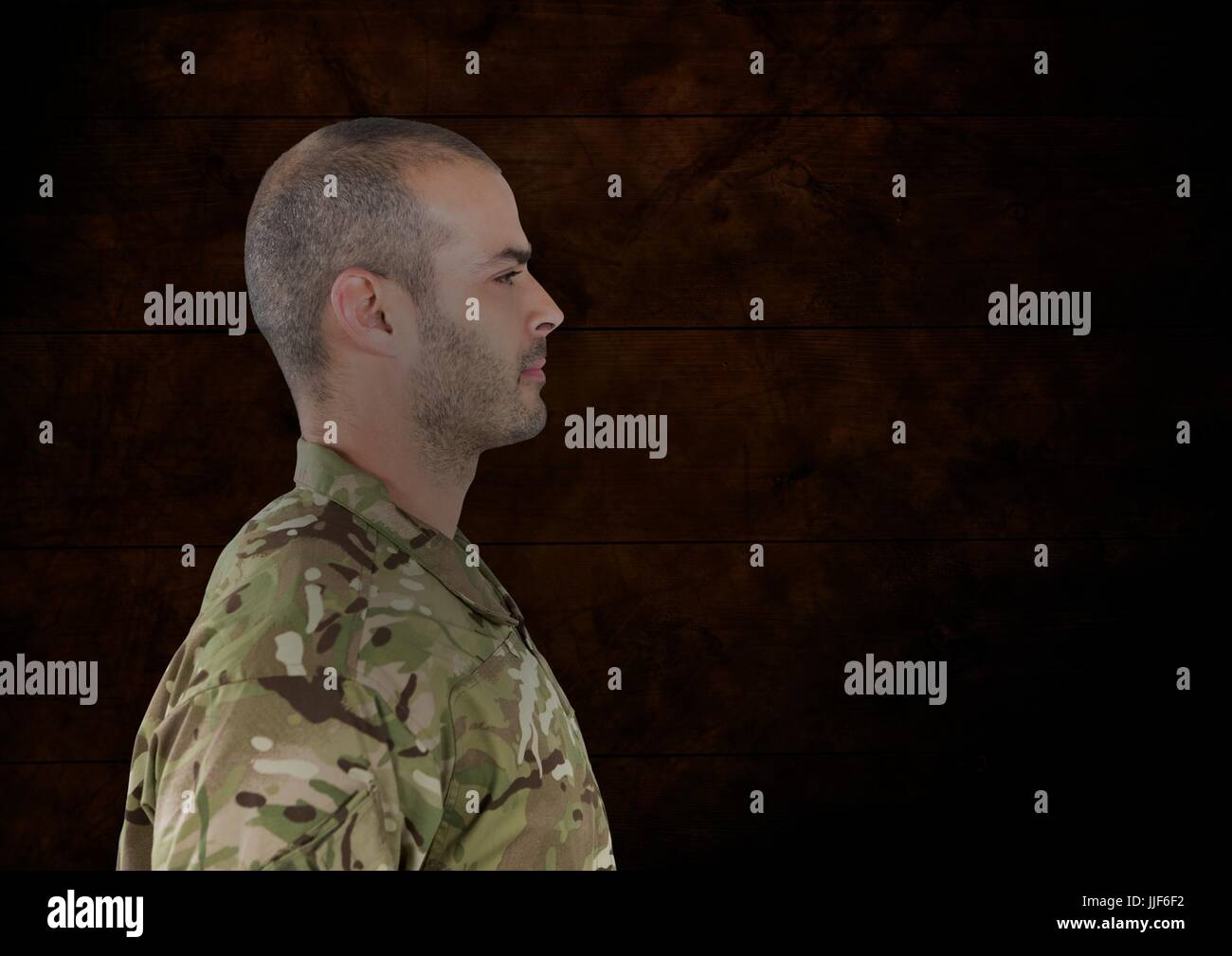 Digital composite of soldier side-face with red and black background ...