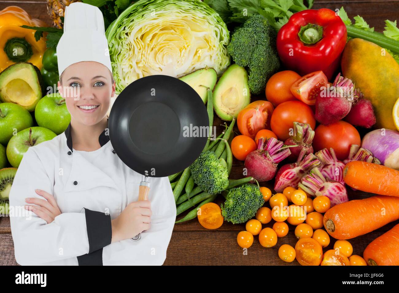 Digital composite of chef against vegetable background Stock Photo - Alamy