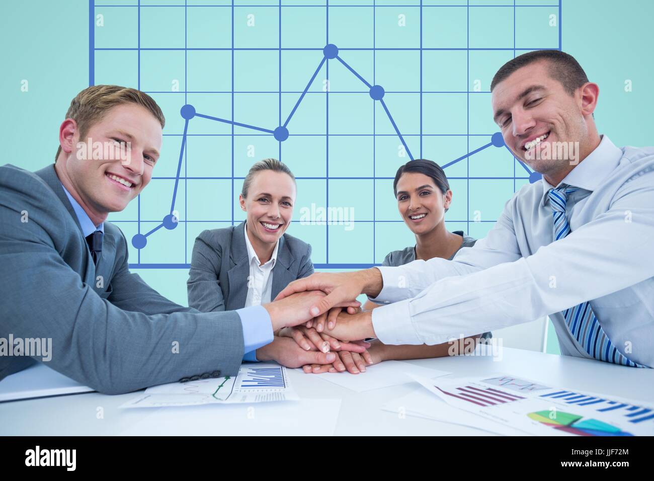 Digital composite of Business workers gather their hands together ...