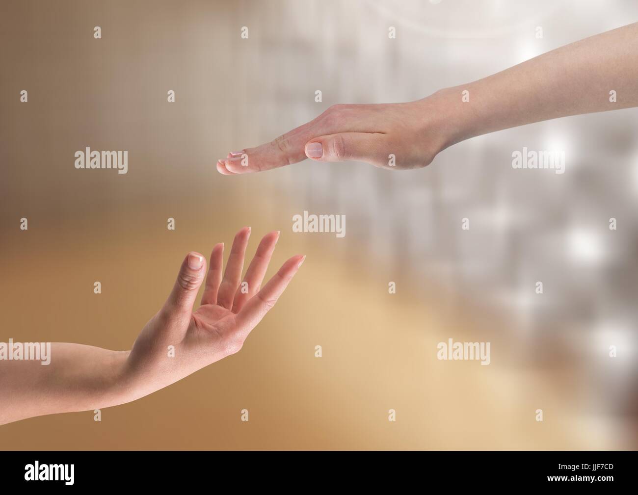 Digital composite of Hands reaching to eachother helping with sparkling ...
