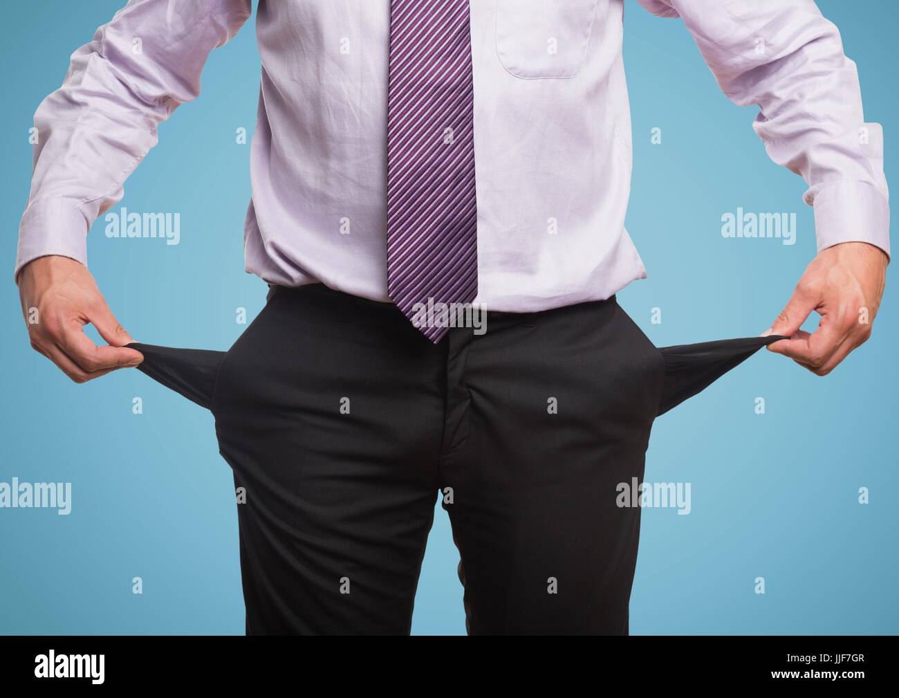 Businessman pulling empty out pants hi-res stock photography and images ...