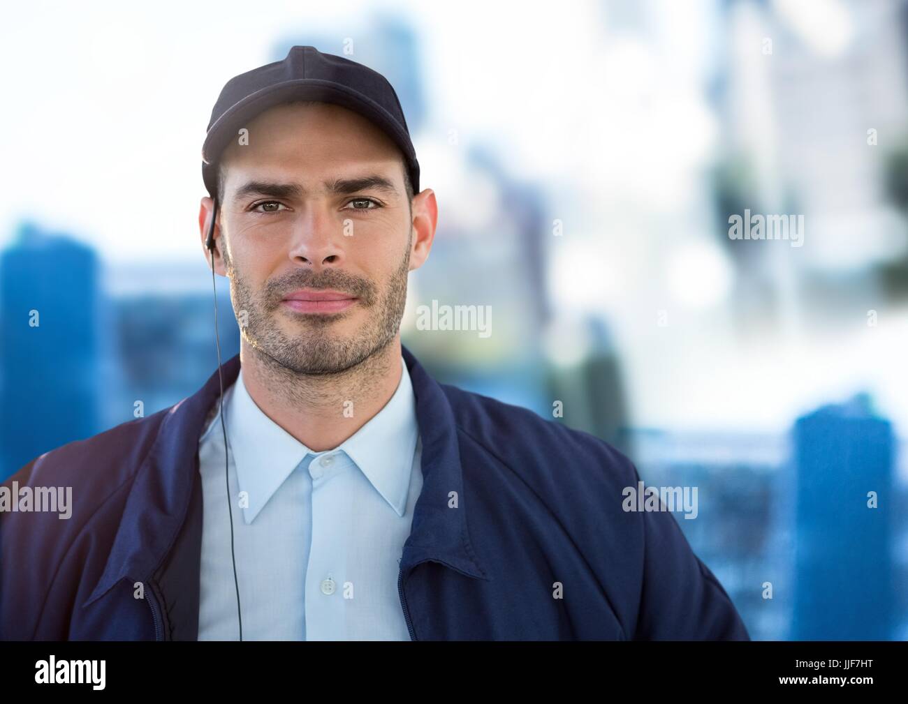 Digital composite of Security man outside city Stock Photo - Alamy