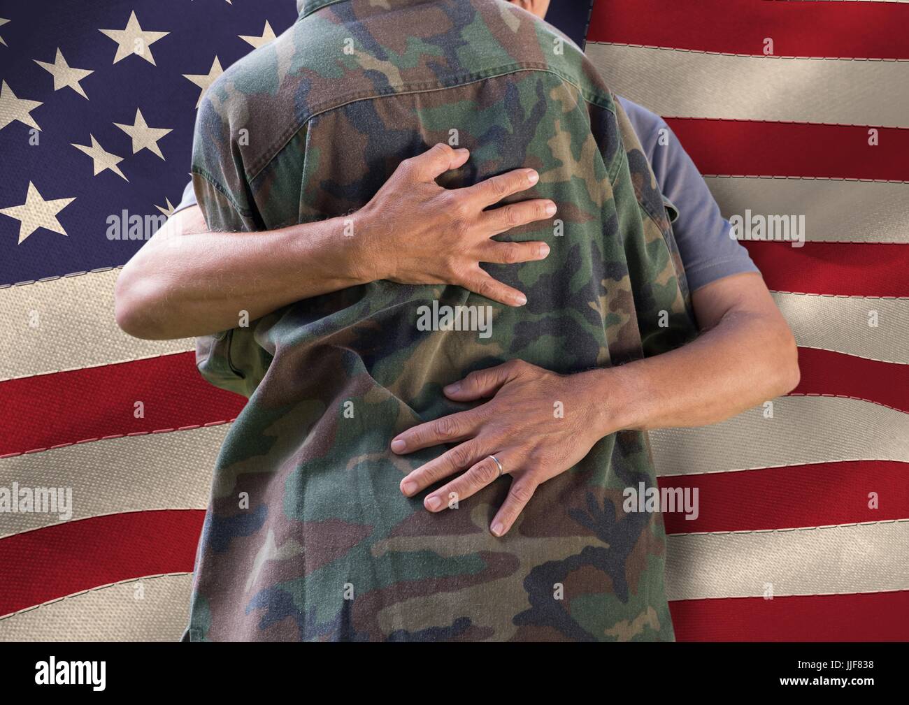 Digital composite of soldier hugging family in front of usa flag Stock ...