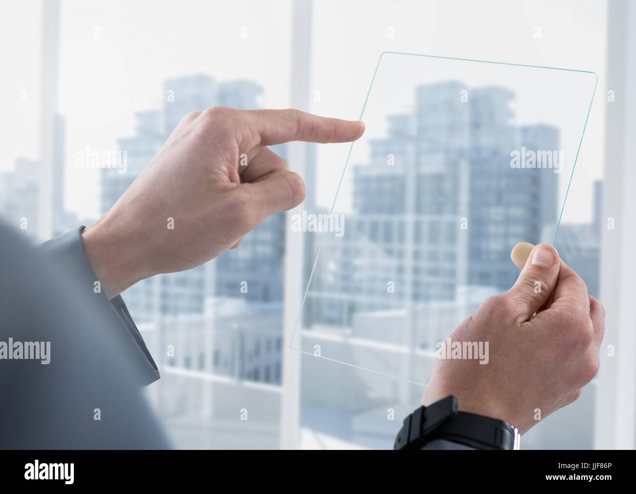 Digital composite hand holding glass interface hi-res stock photography ...