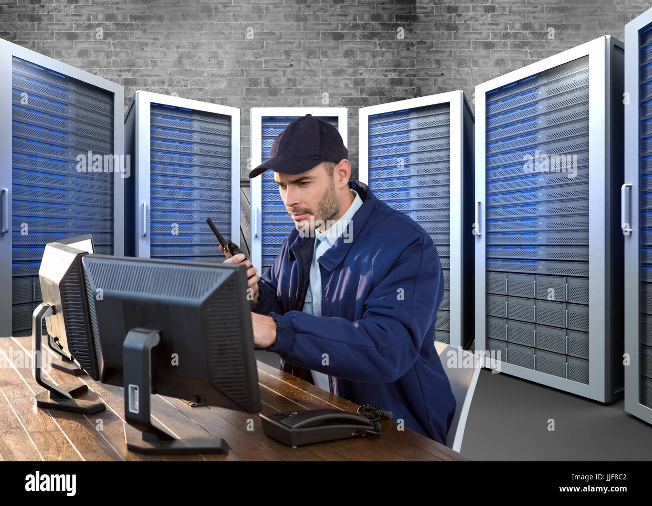 Digital composite of security guard in servitor room with computers ...