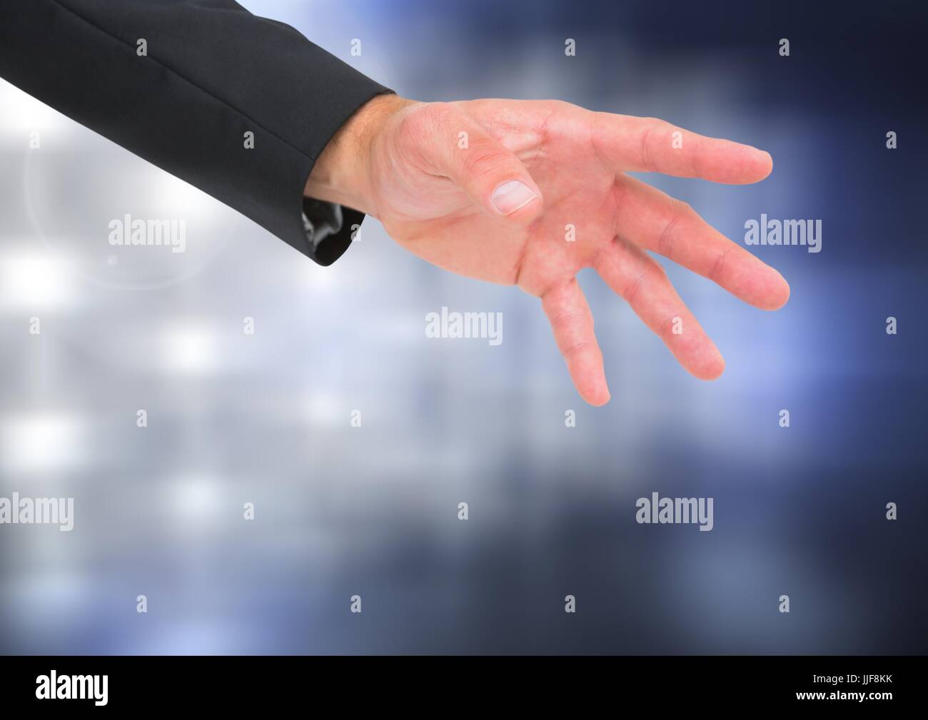 Digital composite of Hand open with sparkling light bokeh background ...