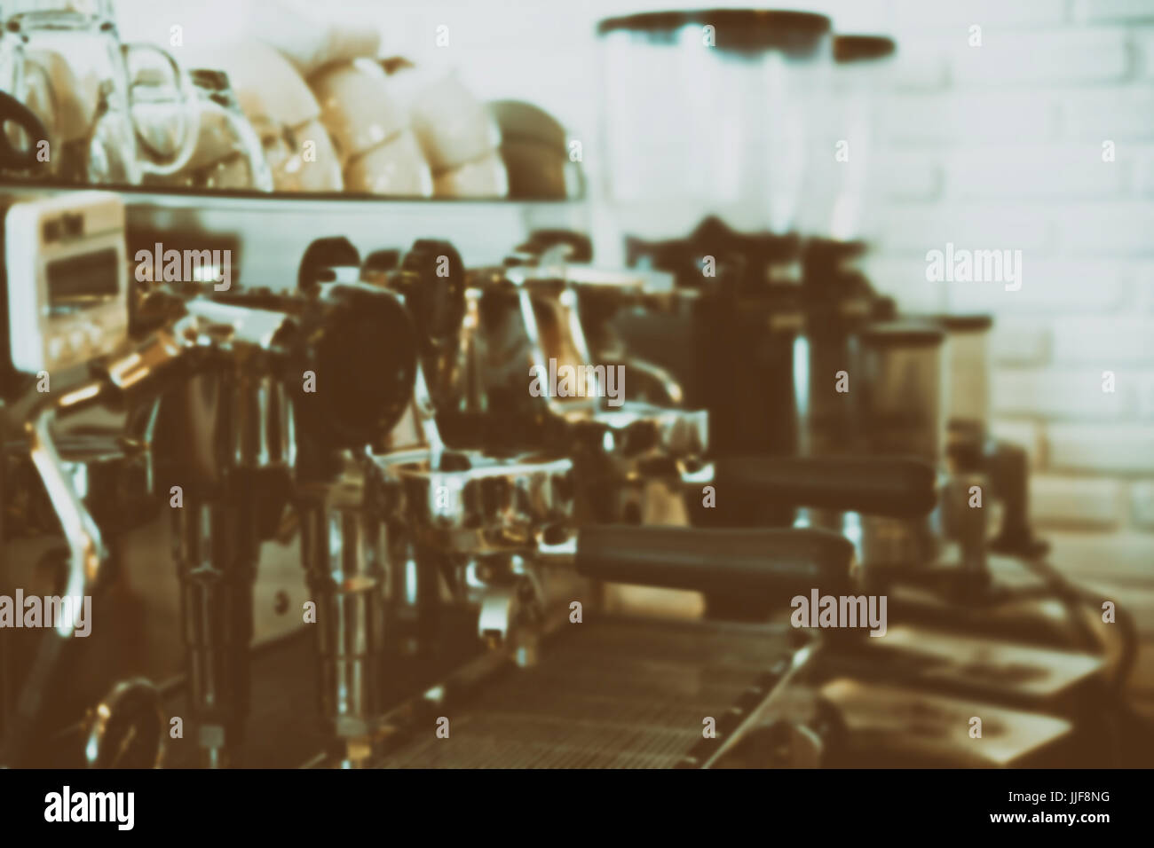 Professional coffee maker machine brewing fresh espresso coffee in cafe ...