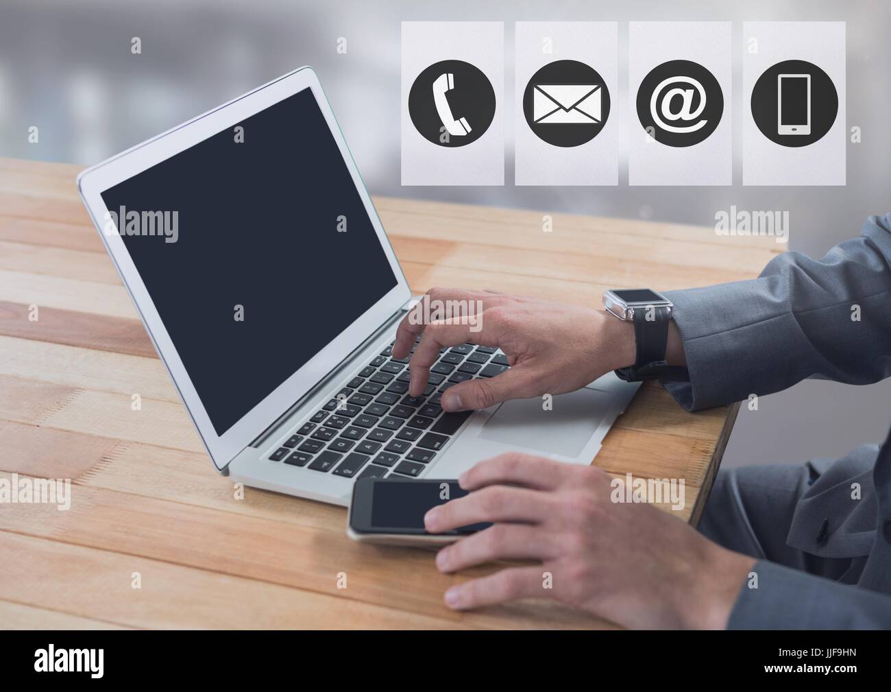 Digital composite of Businessman on laptop with contact icons by ...