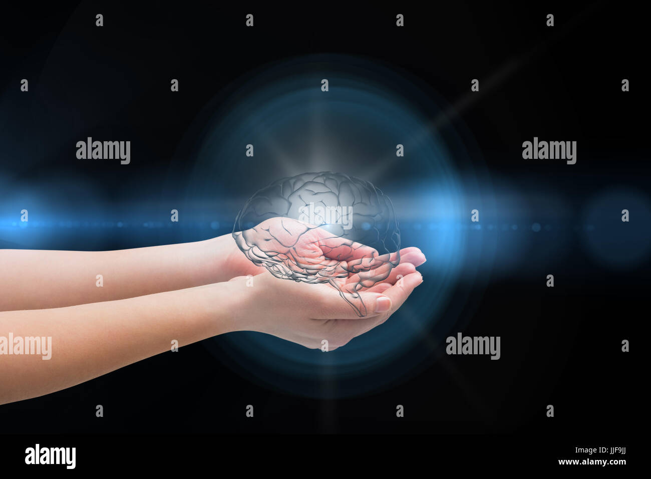 Digital composite of Brain on hands Stock Photo - Alamy