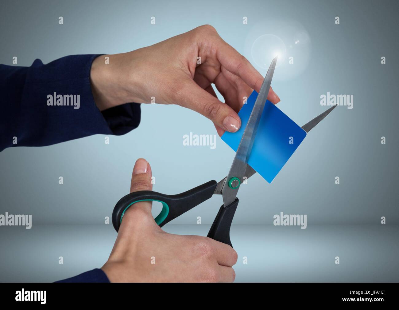 Digital composite of Hands cutting bank card with scissors Stock Photo ...