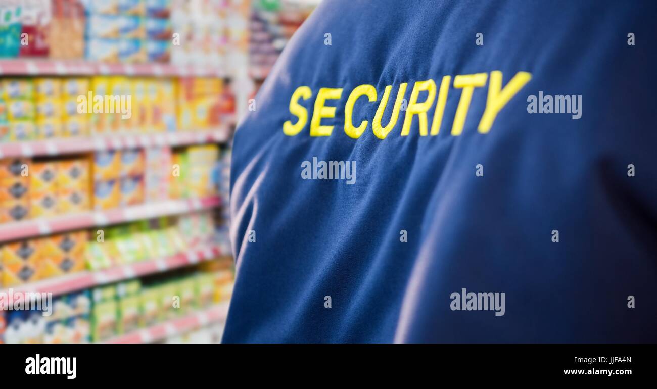 Digital composite of security guard in the supermarket Stock Photo - Alamy
