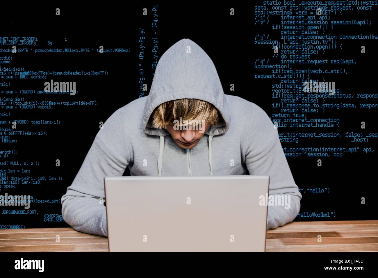 Digital composite of hacker using his laptop against order lines Stock ...