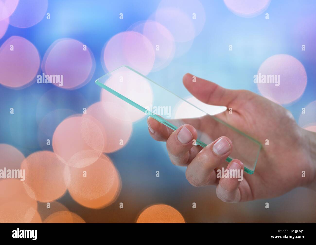 Digital composite hand holding glass interface hi-res stock photography ...