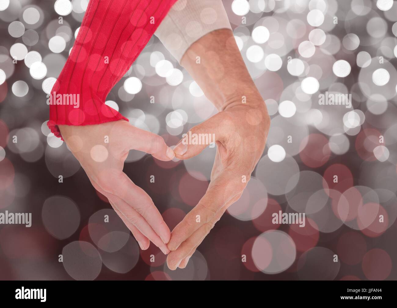 Digital composite of Couple crossing their hands together to make an ...