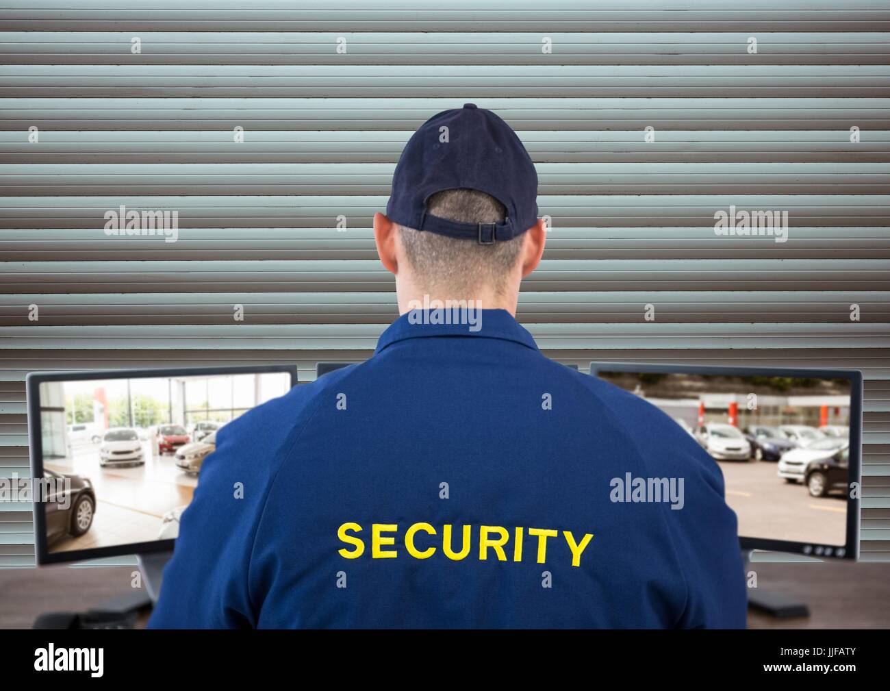 Digital composite of security guard looking the image of the security ...