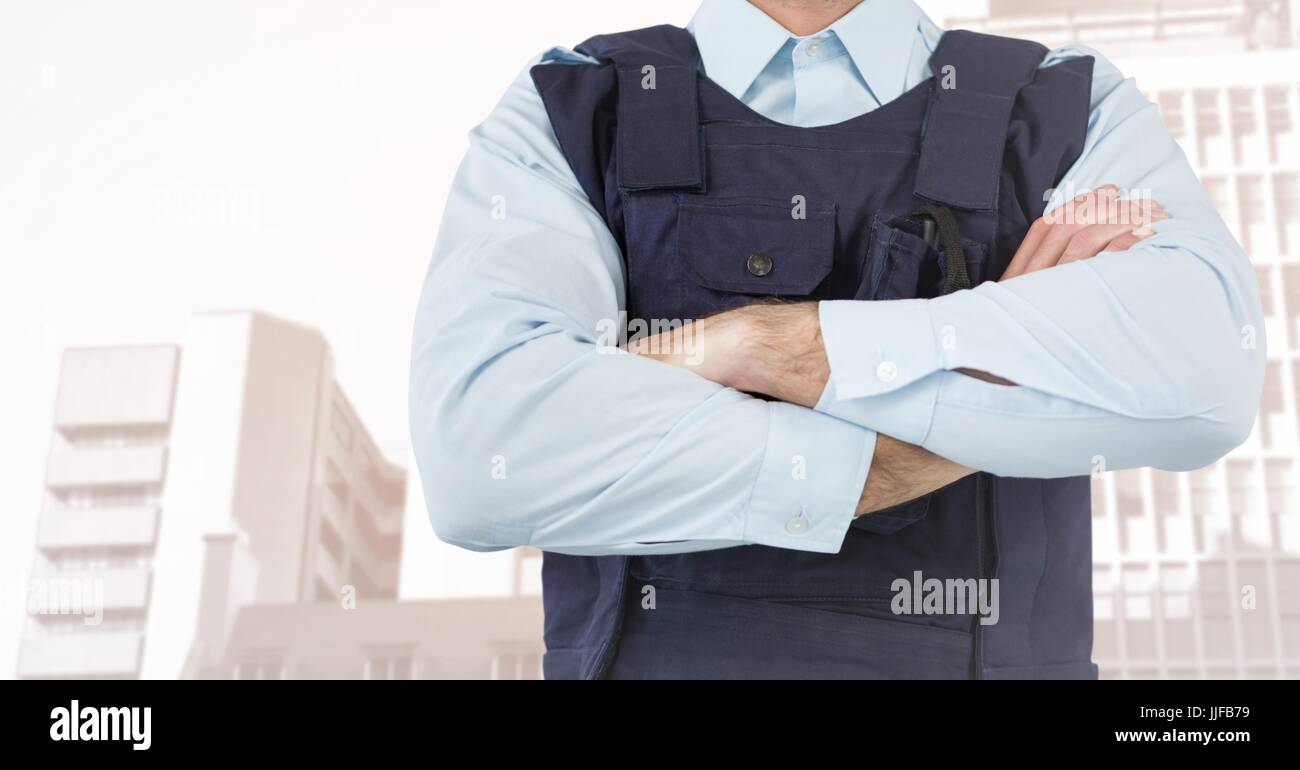 Digital composite of Security guard mid section arms folded against ...