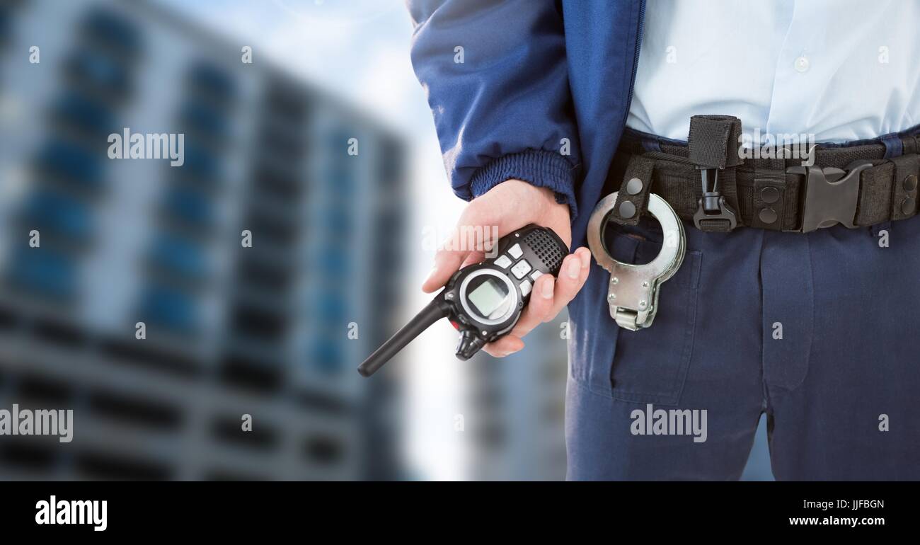 Digital composite of Security man outside buildings Stock Photo - Alamy