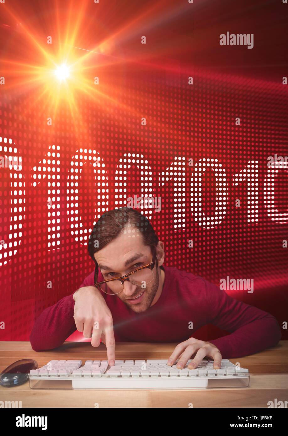 Digital composite of Hipster man taping on a keyboard in front of red ...