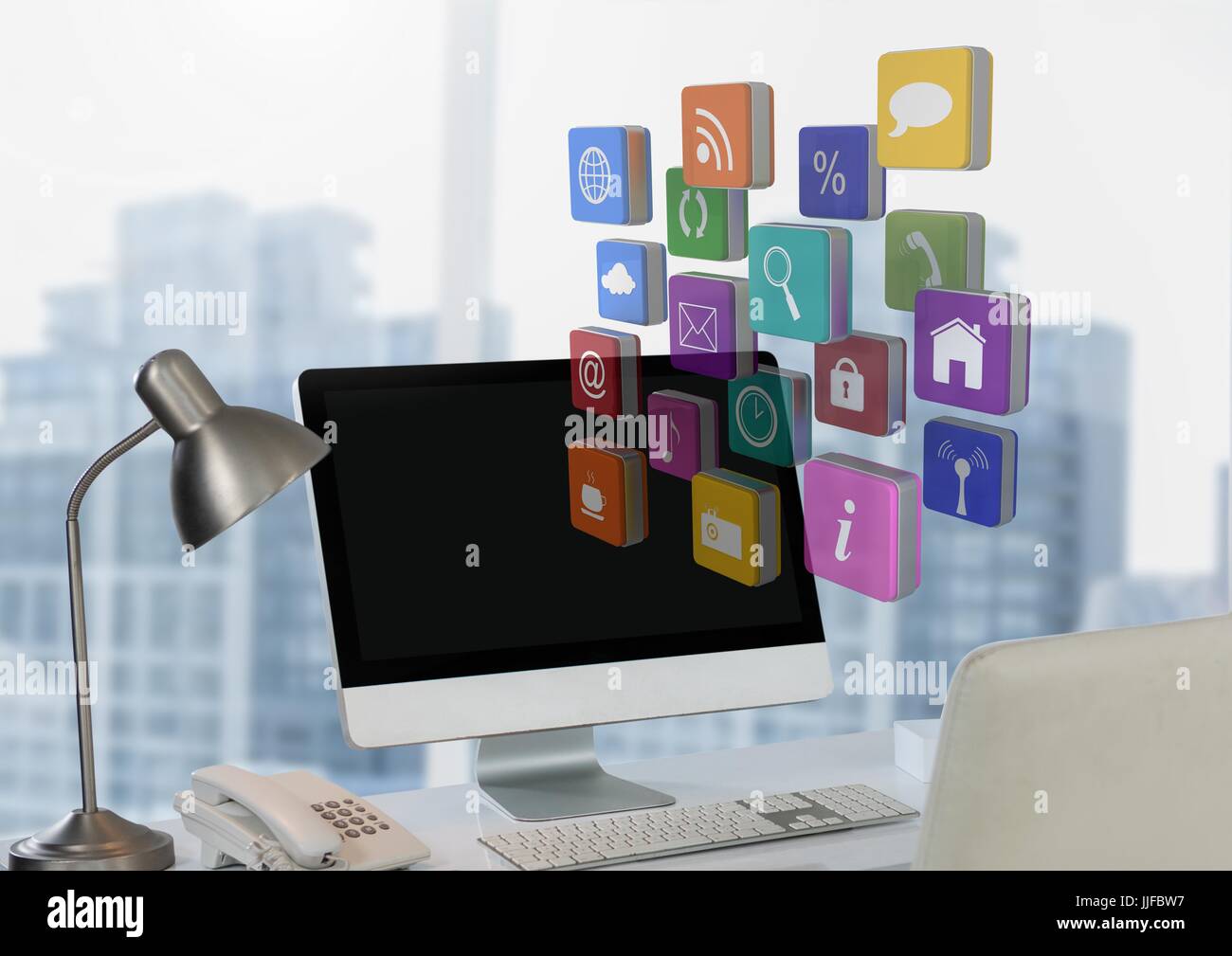 Digital composite of Computer on desk with apps against city window ...