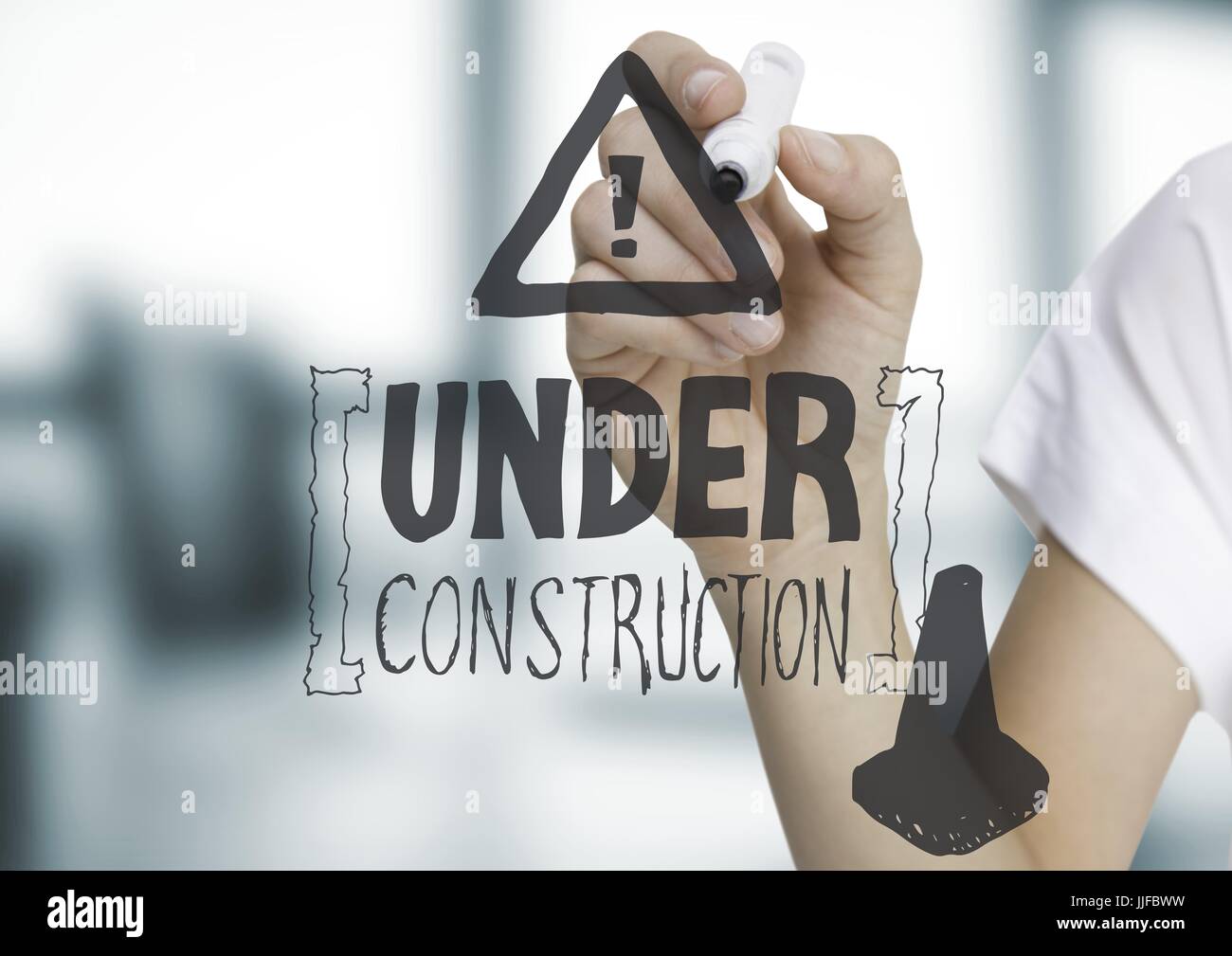 Digital composite of Hand writing construction doodle in blurry grey ...