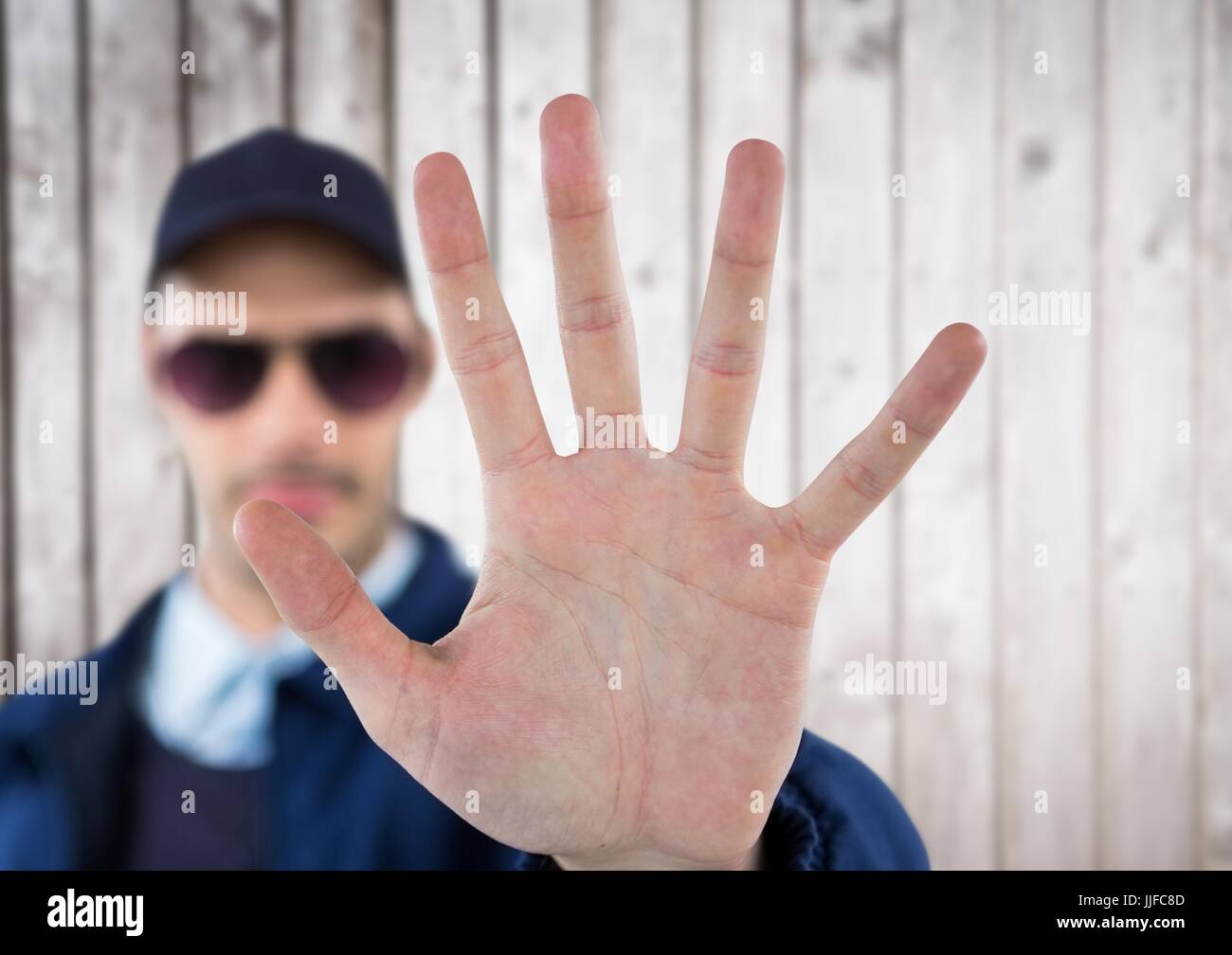 Security guard holding hand out hi-res stock photography and images - Alamy