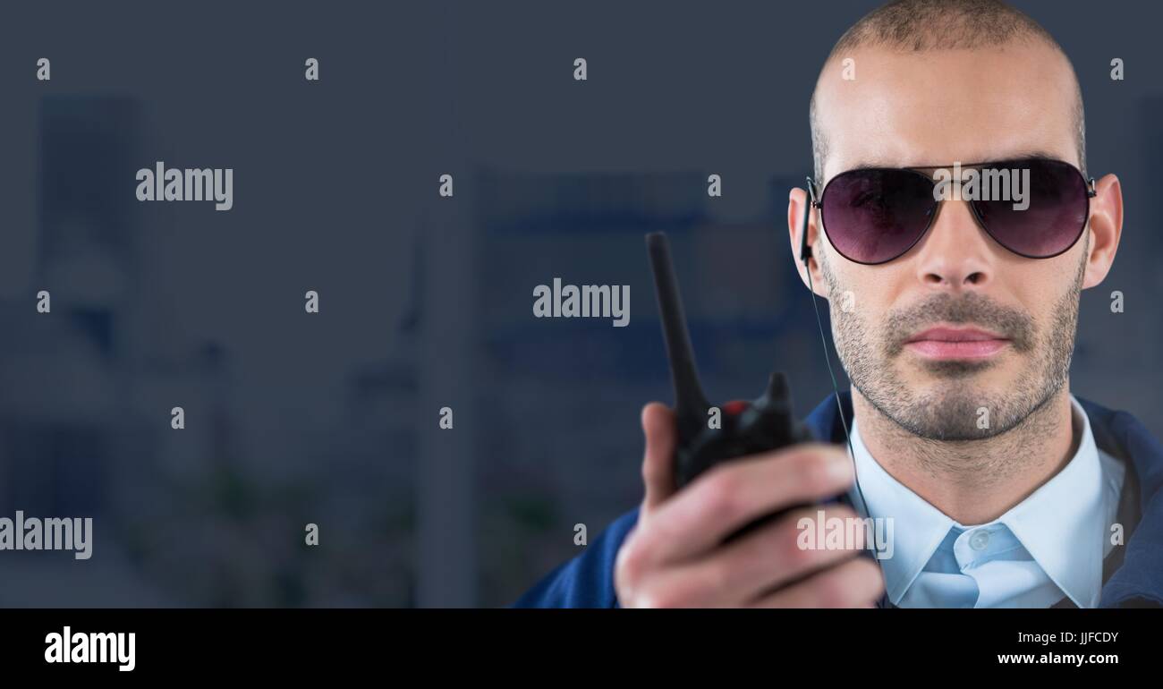 Handsome security guard listening hi-res stock photography and images ...