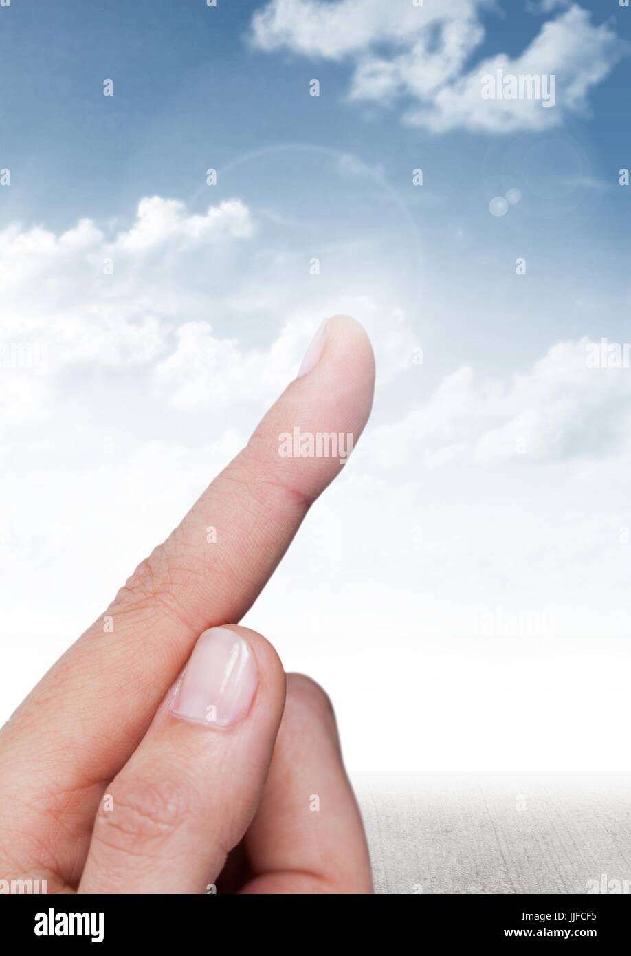 Digital composite of Hand touching air with sky background Stock Photo ...