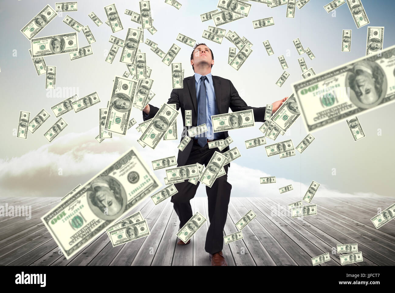 Digital composite of business models with falling money Stock Photo - Alamy