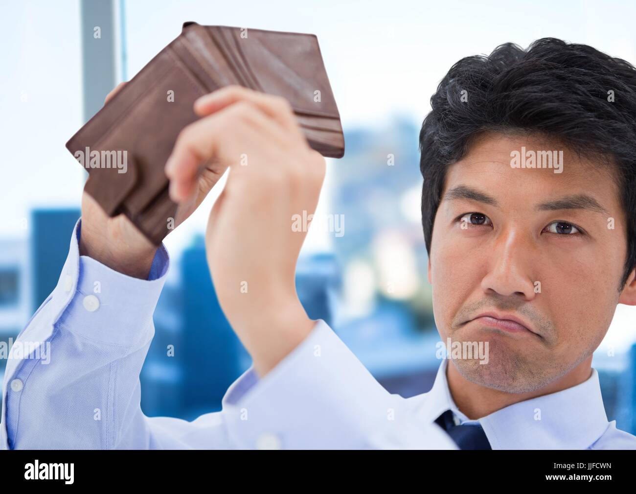 Man in suit showing wallet hi-res stock photography and images - Alamy