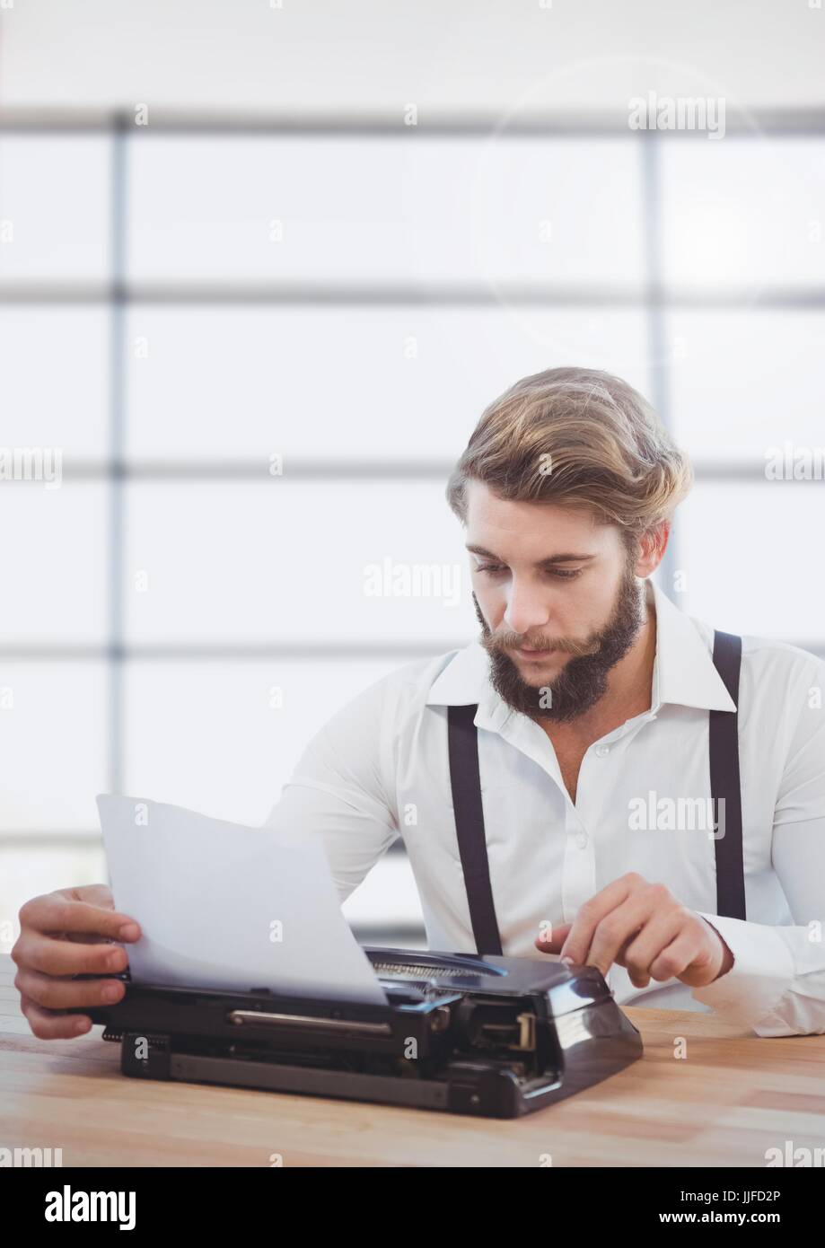 Digital composite of Hipster man on typewriter with windows Stock Photo ...