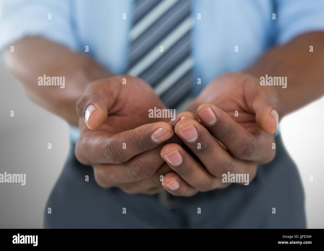 Digital composite of cupped hands Stock Photo - Alamy